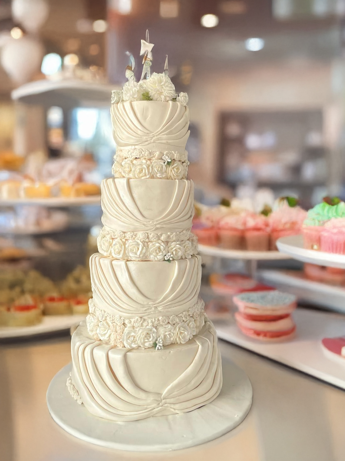 Elegant Ivory Cascade Cake - Victoria Confectionery